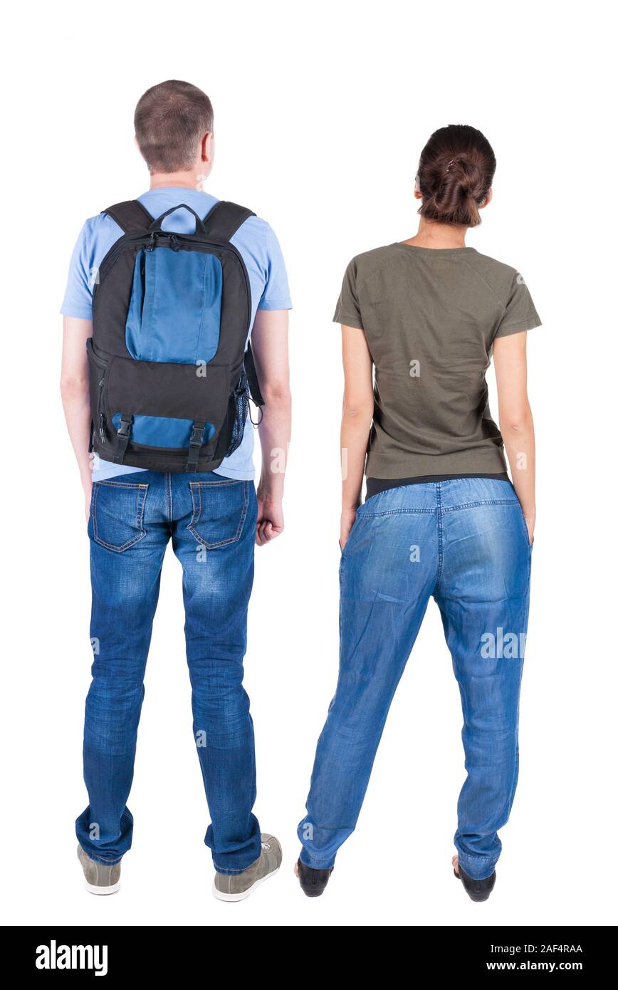 Back view of couple. beautiful friendly girl and guy together. Rear ...