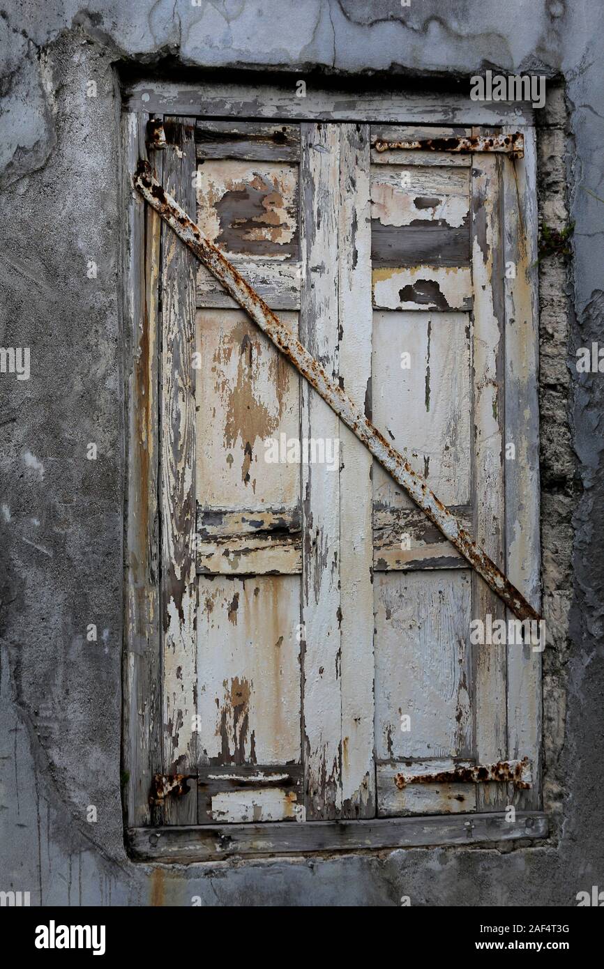 old Wall, old wooden window and iron lock Stock Photo - Alamy