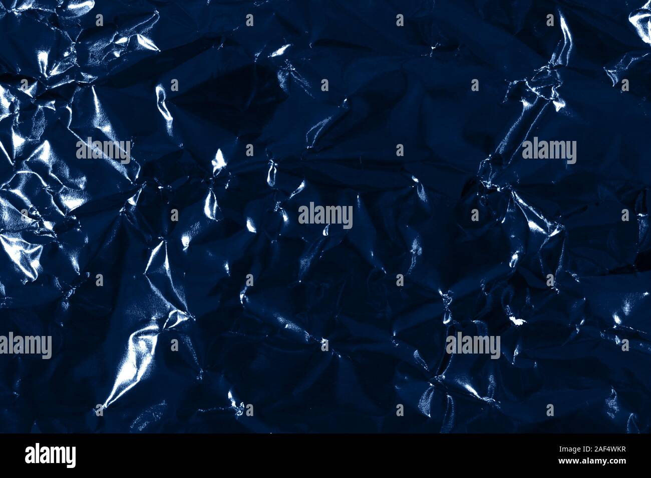 Crumpled paper for background usage. Classic blue color of year 2020 ...