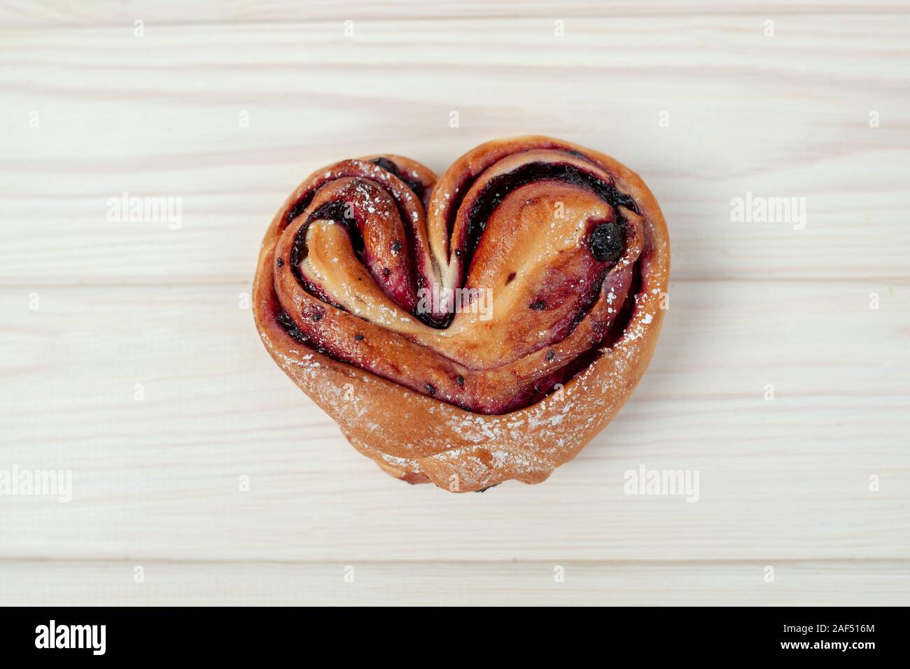 Rustic with black current berry filling pie on white wooden table ...