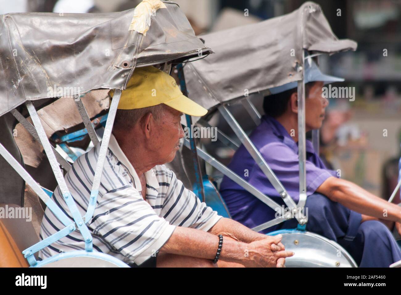 Rickshaw driver waiting for fare vietnam hi-res stock photography and ...