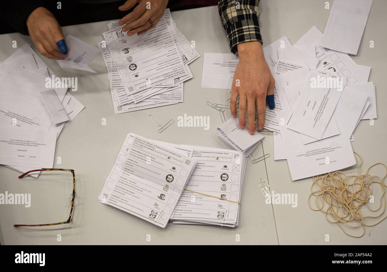Ballot papers are verified during the count at Islington Town Hall for ...