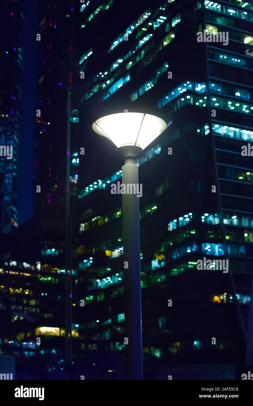 Modern high corporate building at night Stock Photo - Alamy