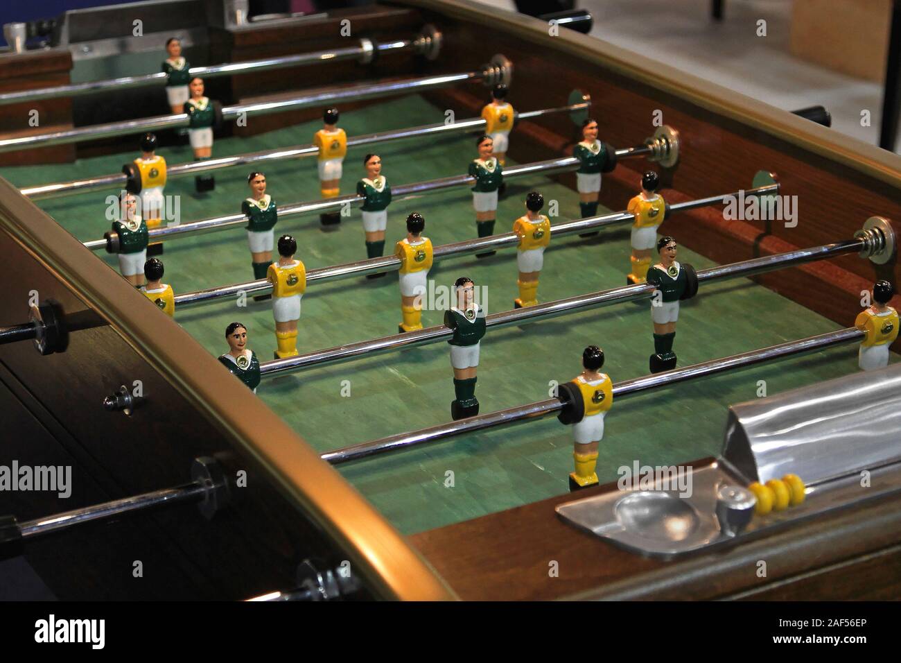 Vintage style table top football in bar Stock Photo - Alamy