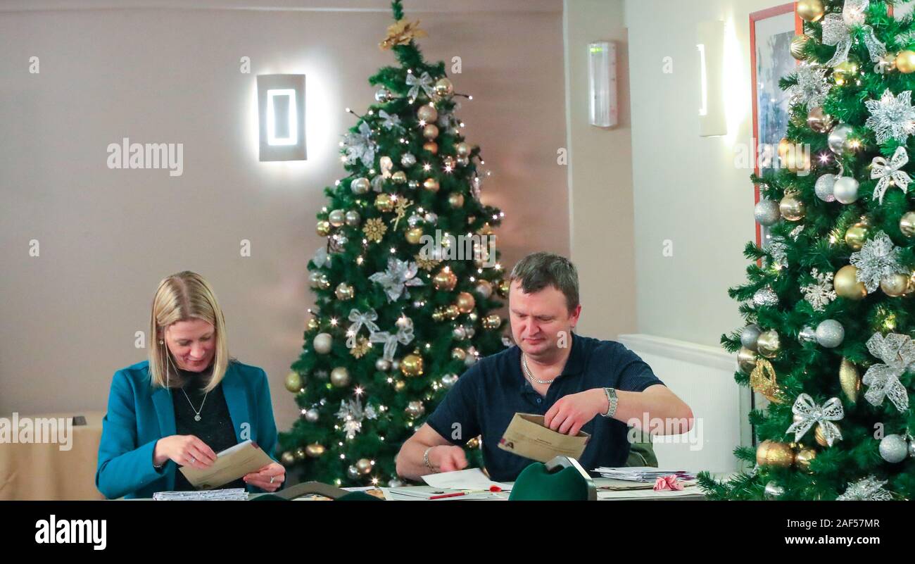 Counting staff at Newcastle-under-Lyme start to count the postal votes ...