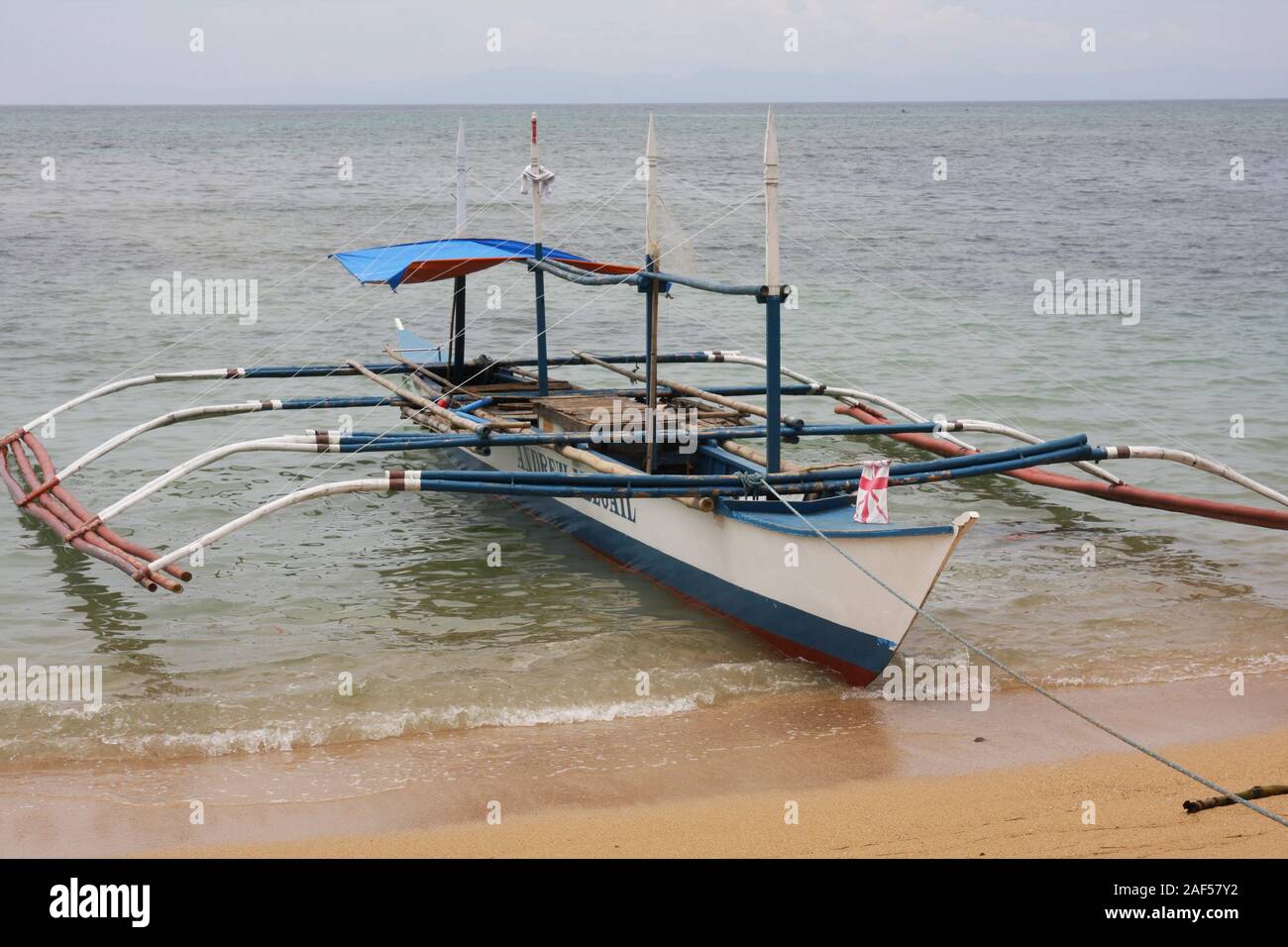 Bangkas (or bankas), traditional outrigger wooden boats used by the ...