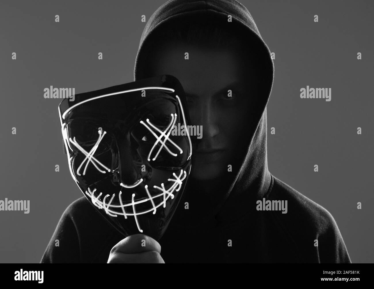 Hiding identity Black and White Stock Photos & Images - Alamy
