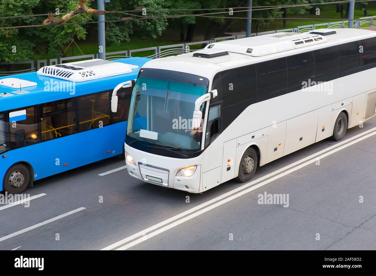 Two buses hi-res stock photography and images - Alamy