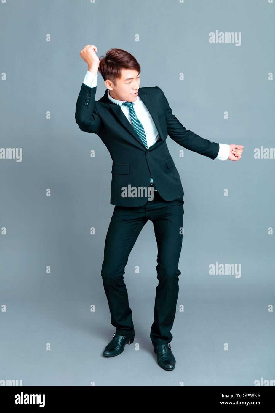 Happy successful businessman dancing in hi-res stock photography and ...