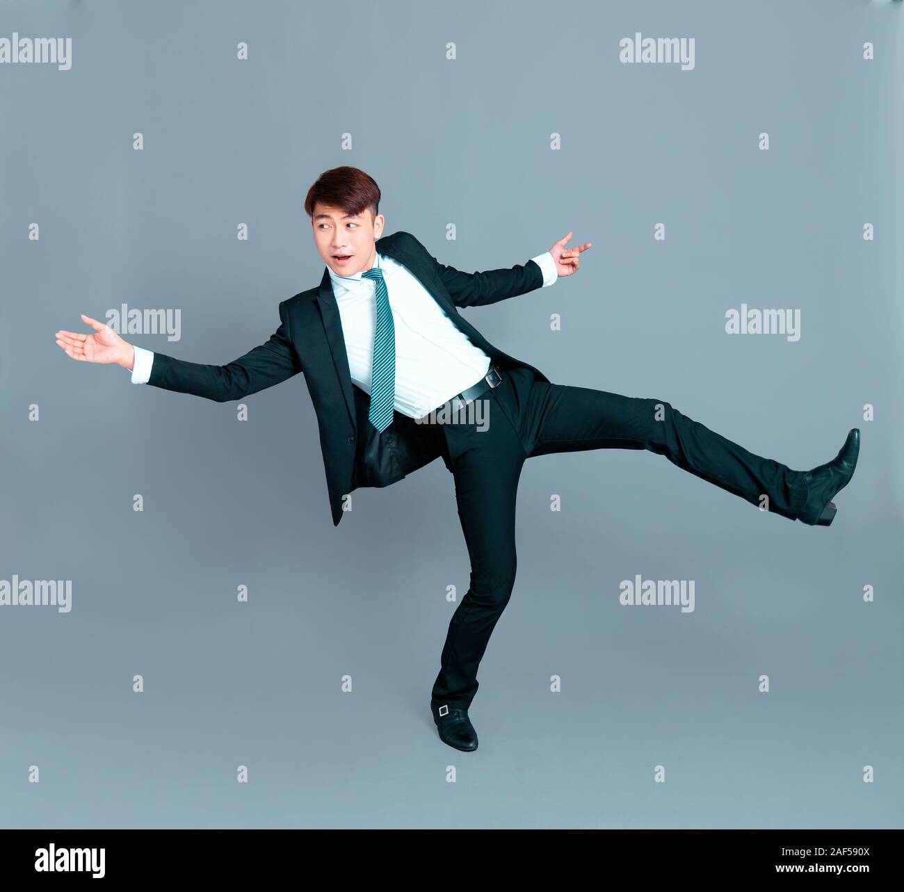 Man dancing in suit hi-res stock photography and images - Alamy