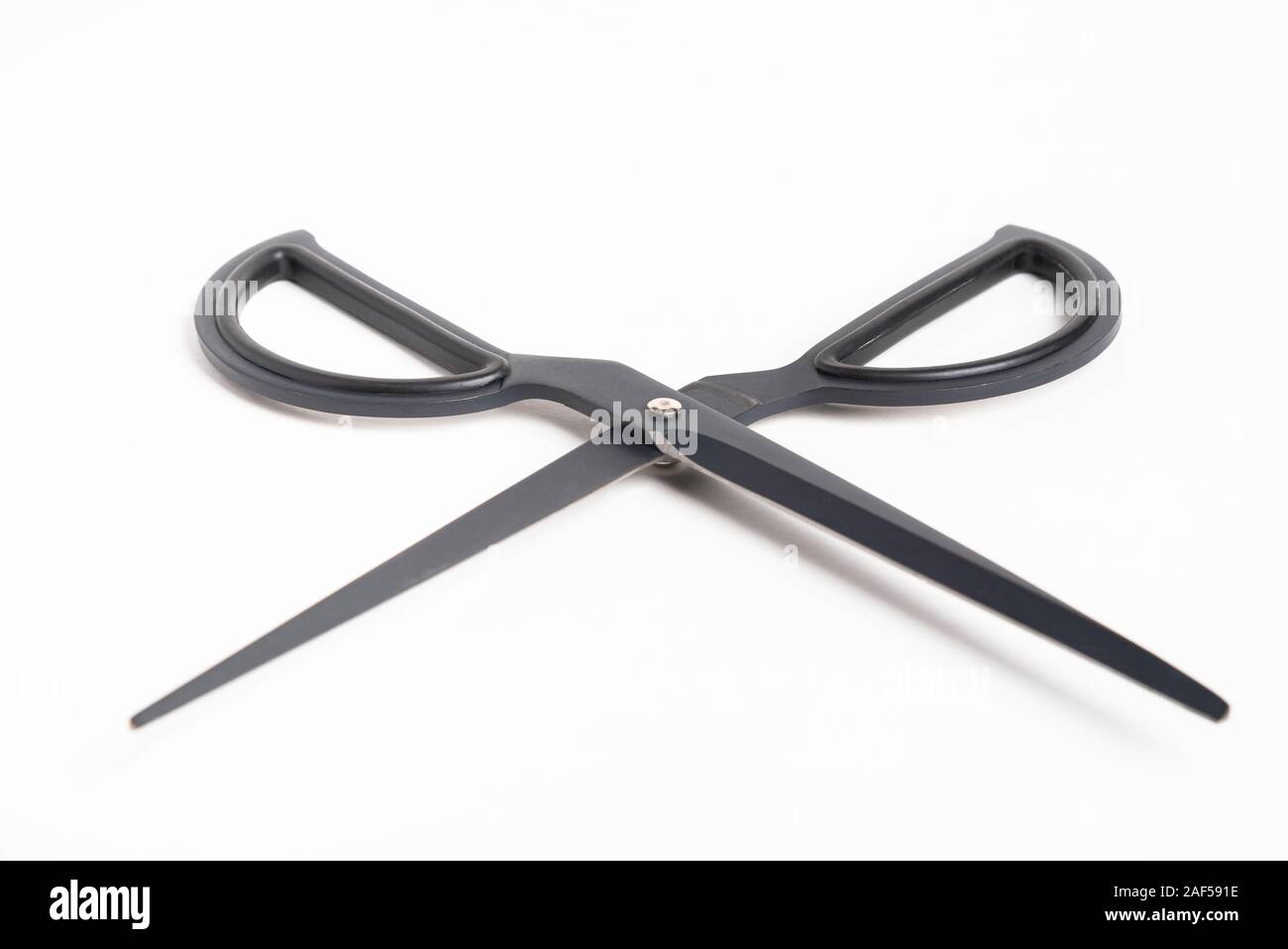 A pair of uniquely designed retro or vintage style scissors in black ...