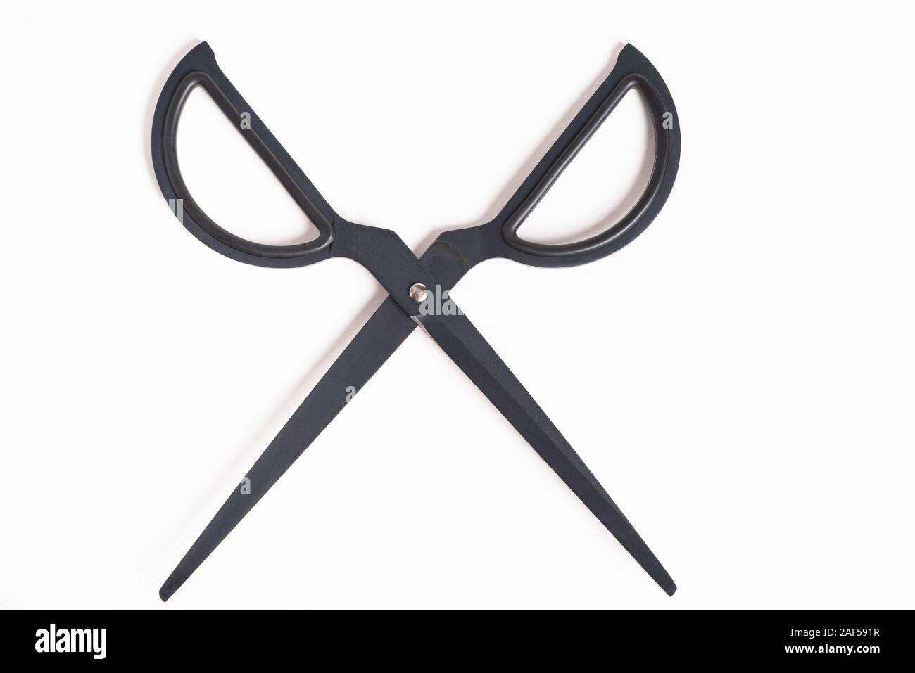 A pair of uniquely designed retro or vintage style scissors in black ...