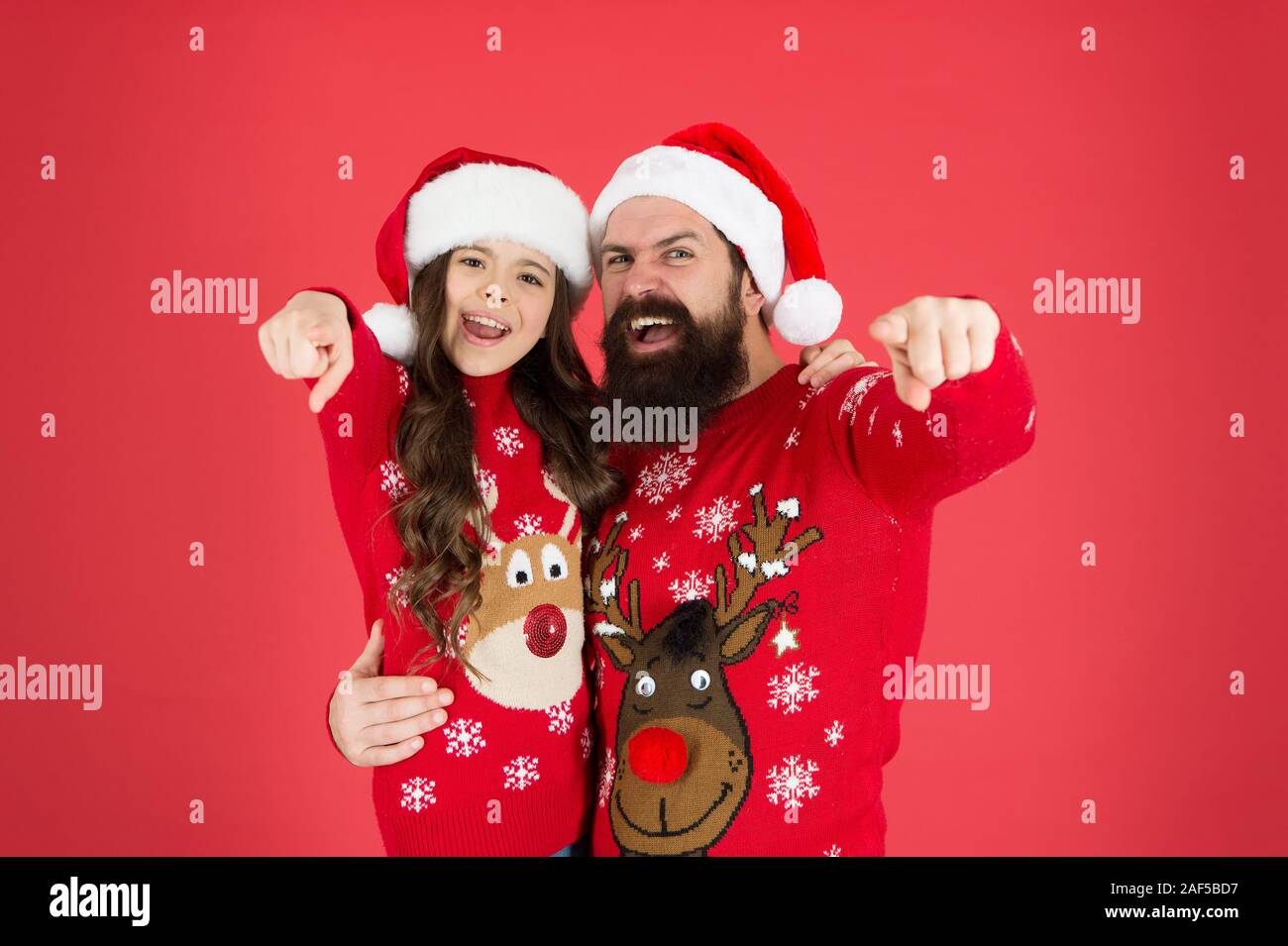 Family time. family holiday party. santa kid and bearded dad red ...