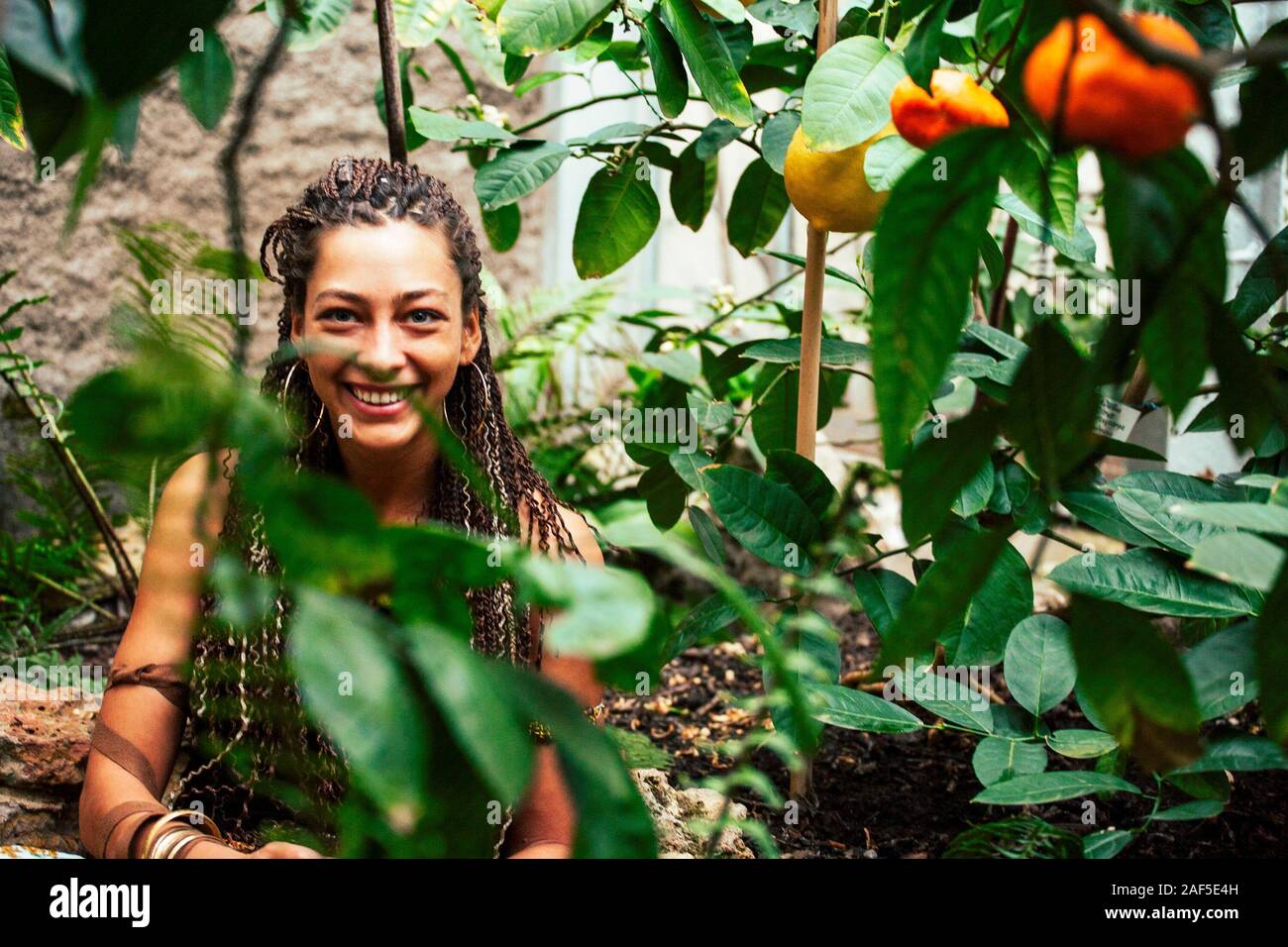 pretty islam woman in orange grove smiling, real muslim girl cheerful ...