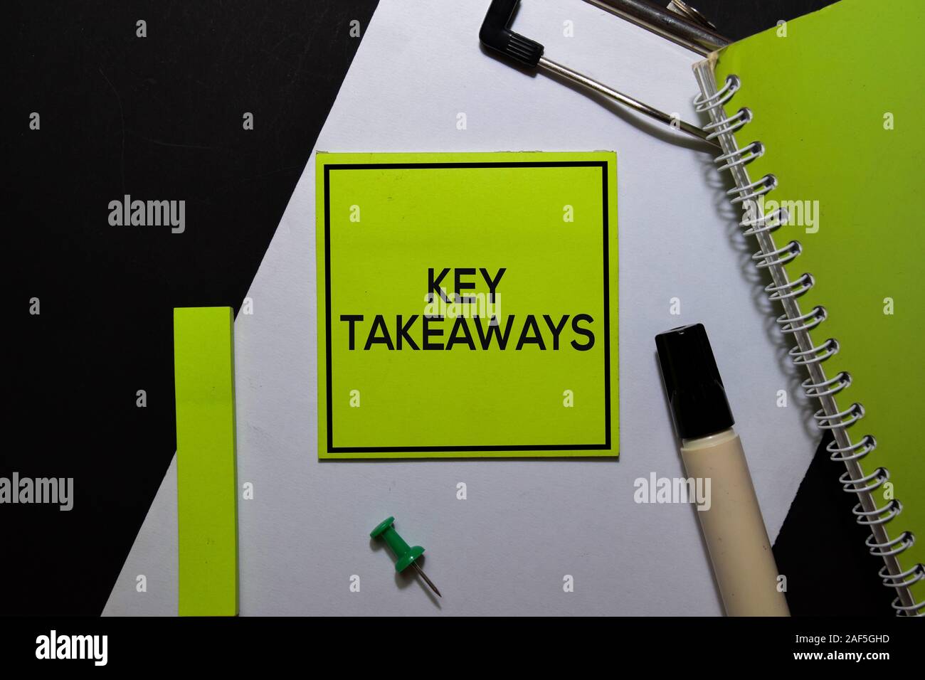 Key Takeaways on sticky Notes isolated on office desk Stock Photo - Alamy