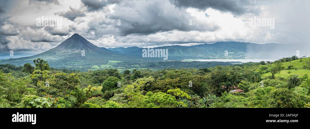 Arenal volcano and lake panorama Stock Photo - Alamy