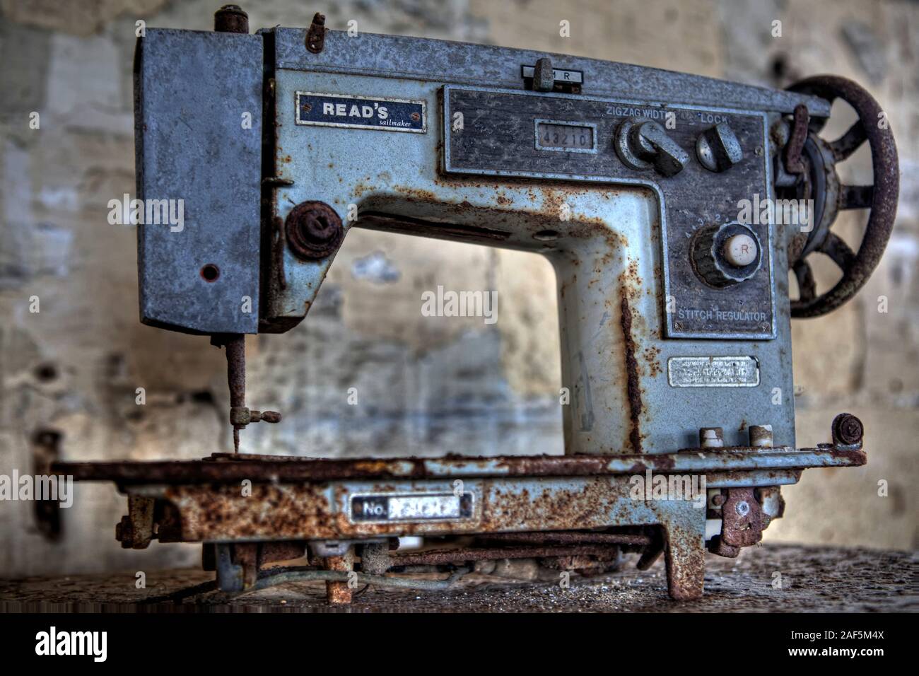 An old and rusty sailmaking sewing machine Stock Photo - Alamy