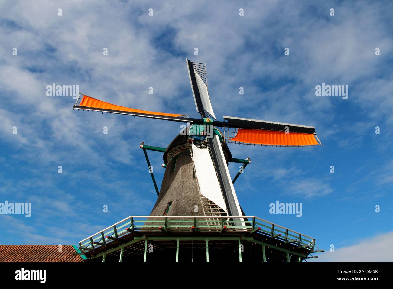 Traditional Dutch windmill with the blue sky in spring at the Zaanse ...