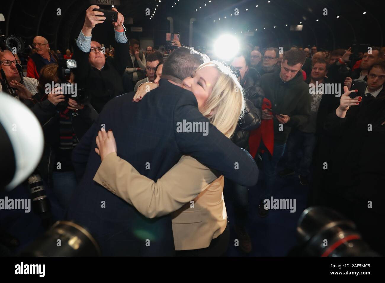 Sinn Fein's John Finucane celebrates with deputy leader Michelle O ...