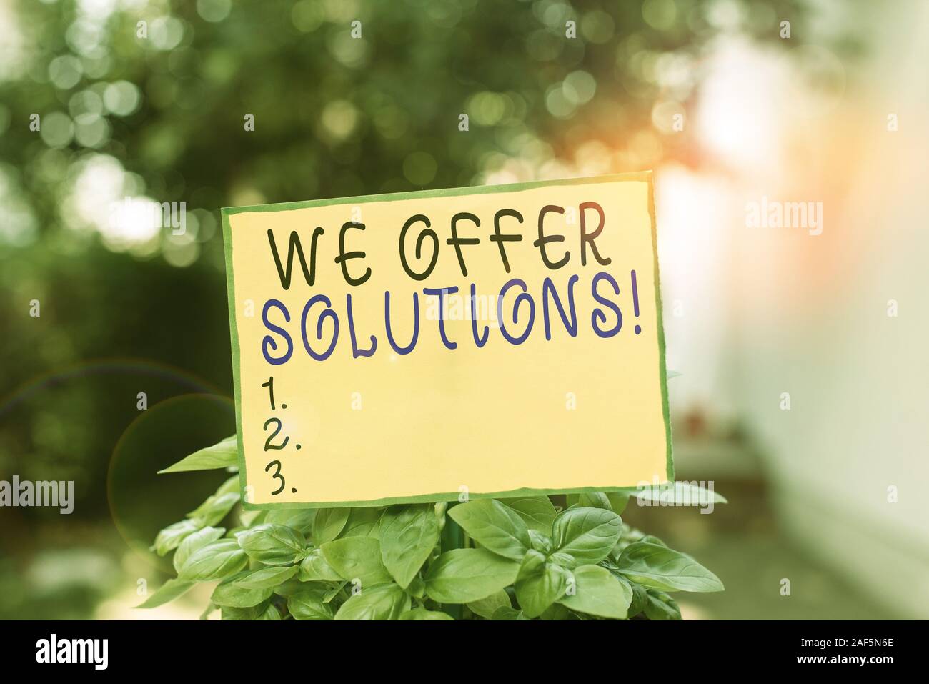 Writing note showing We Offer Solutions. Business concept for way to ...
