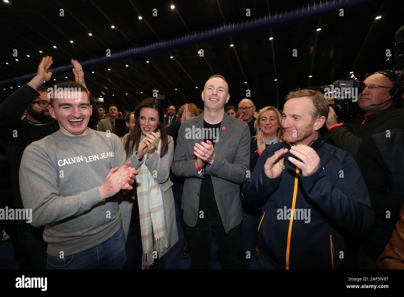 Sinn Fein's Chris Hazzard (centre) after winning the South Down seat at ...