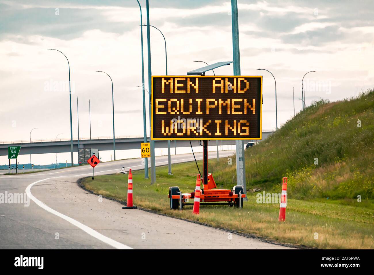 Temporary condition Variable message sign with orange barrels on the ...