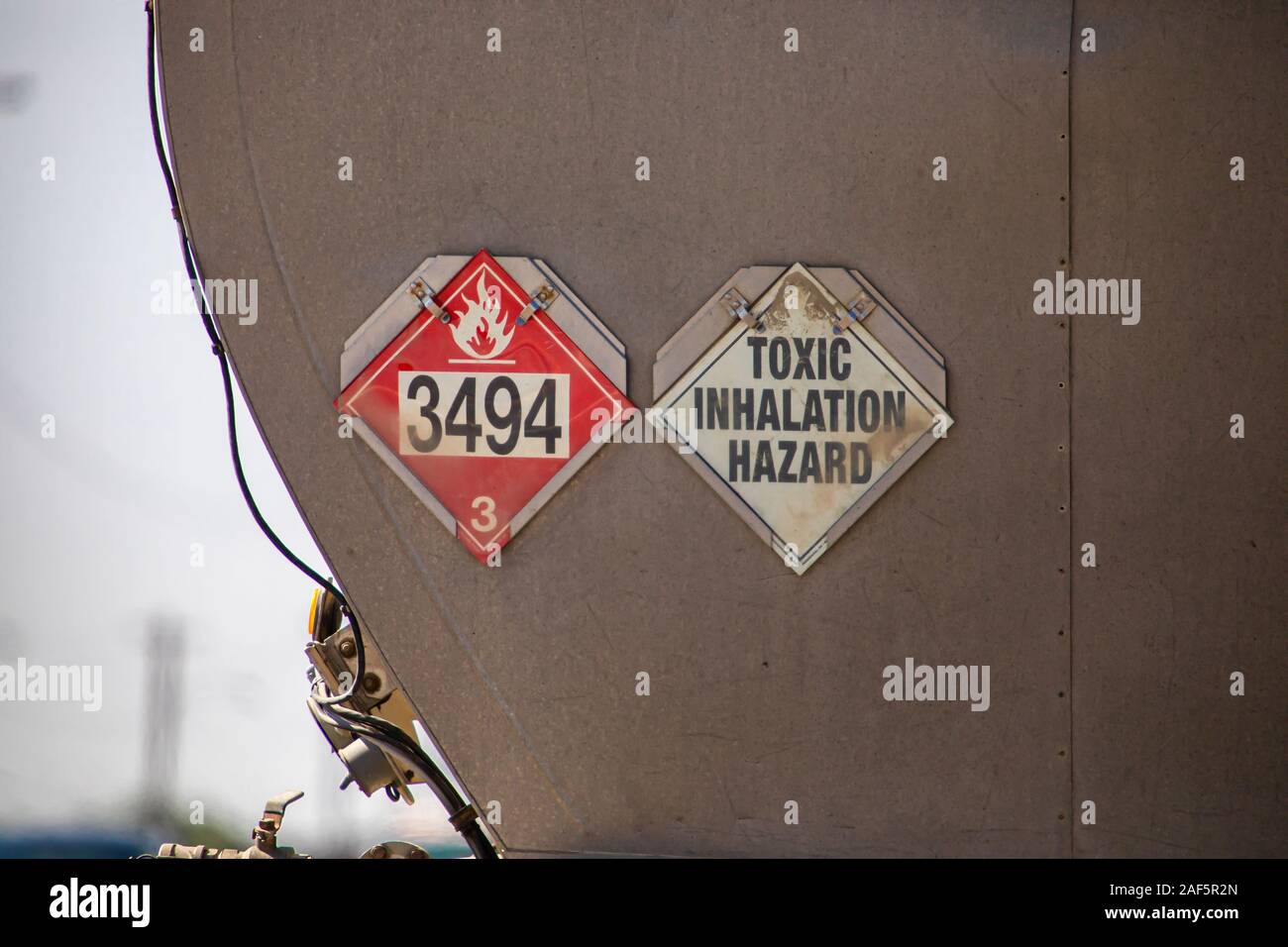 Red Fire sign with 3494 fire symbol and white toxic inhalation hazard ...