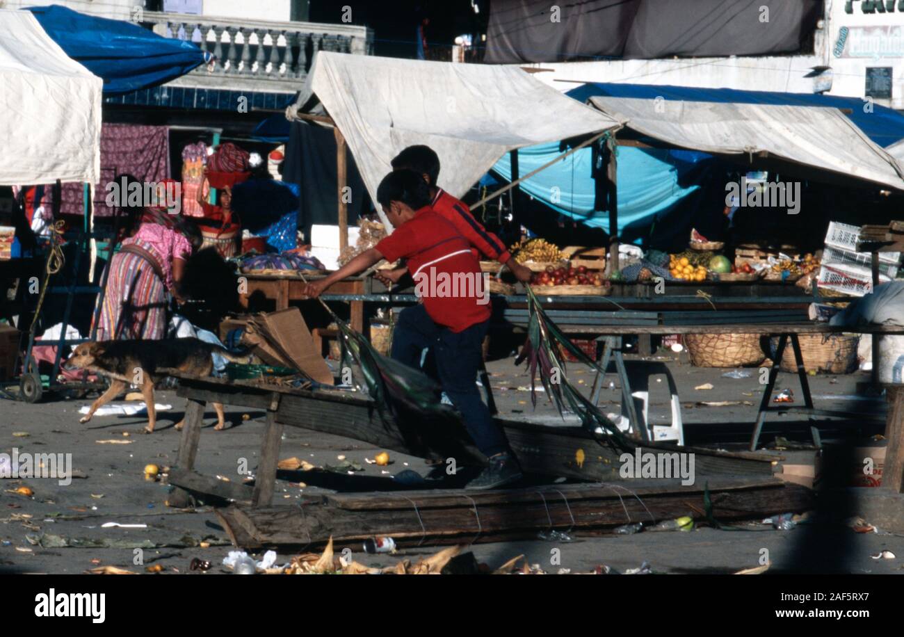 A local market winds down on a Sunday afternoon in the indigenous Kiche ...