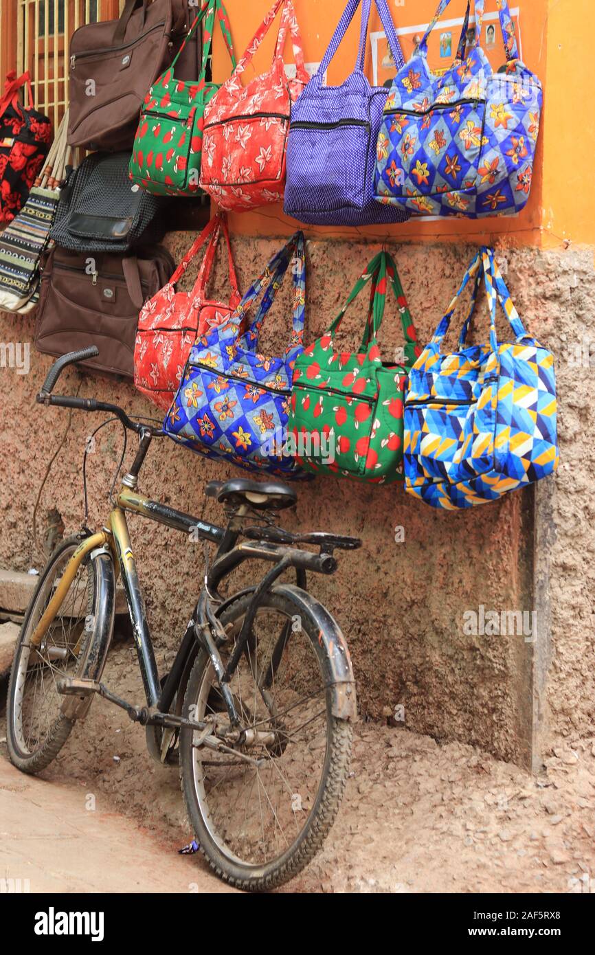 colorful indian bags are displayed on the wall of the market Stock ...