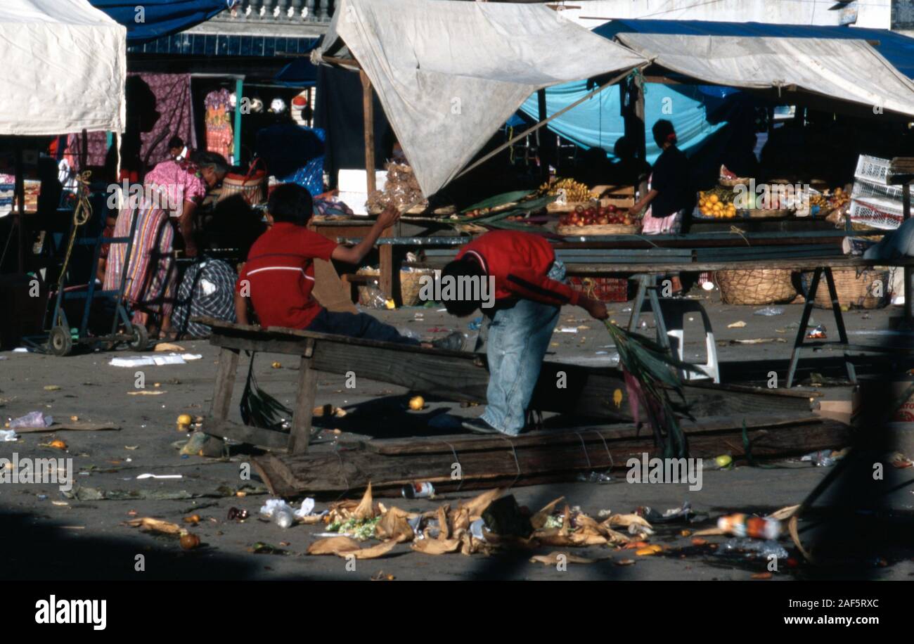A local market winds down on a Sunday afternoon in the indigenous Kiche ...