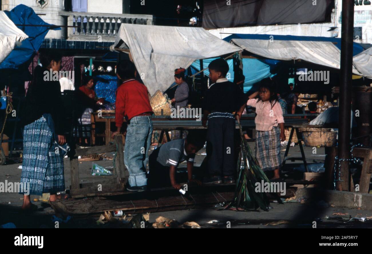 A local market winds down on a Sunday afternoon in the indigenous Kiche ...