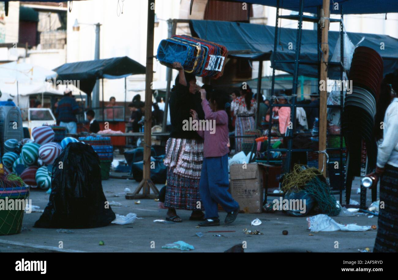 A local market winds down on a Sunday afternoon in the indigenous Kiche ...