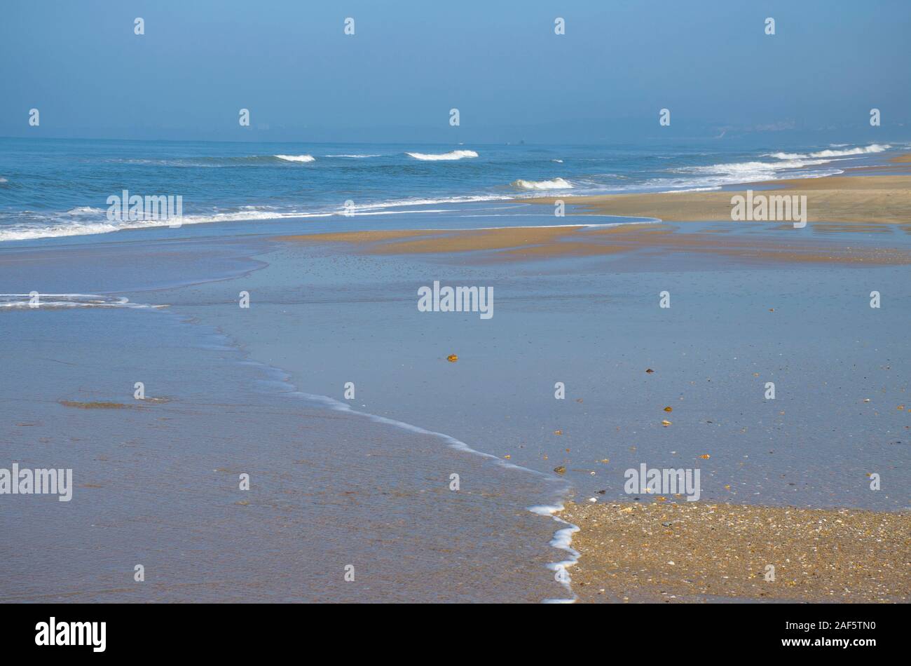 Blue sea with waves in india Stock Photo - Alamy