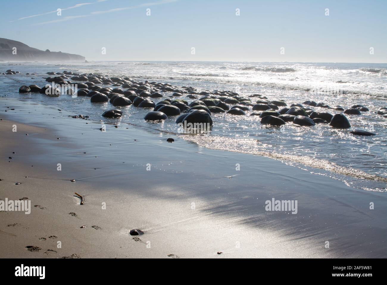 Massive rock outcropping at Bowling ball beach california Stock Photo ...