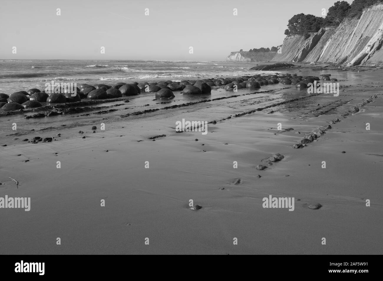 Massive rock outcropping at Bowling ball beach california Stock Photo ...