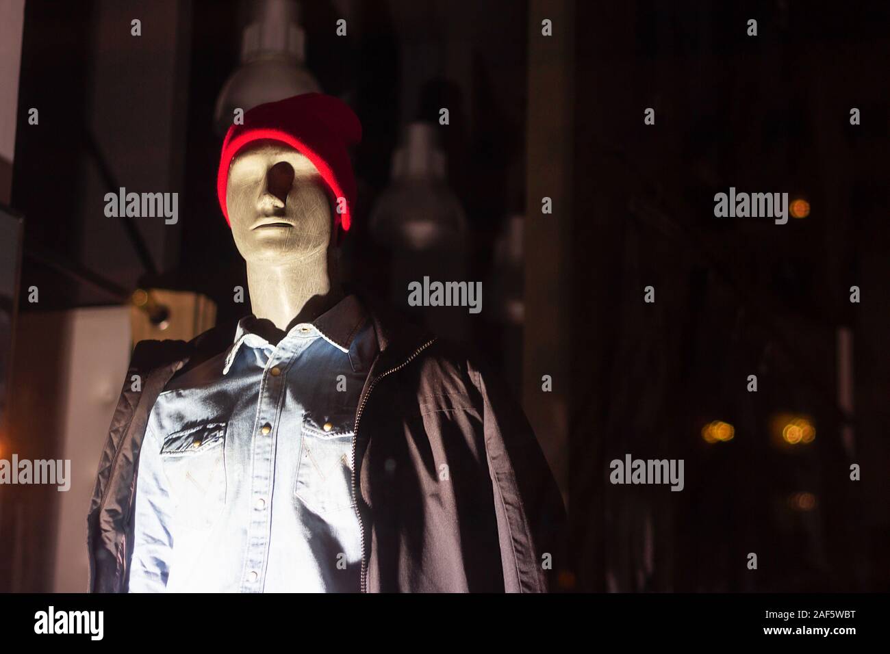 mannequin male in a red cap fashionable casual style Stock Photo - Alamy