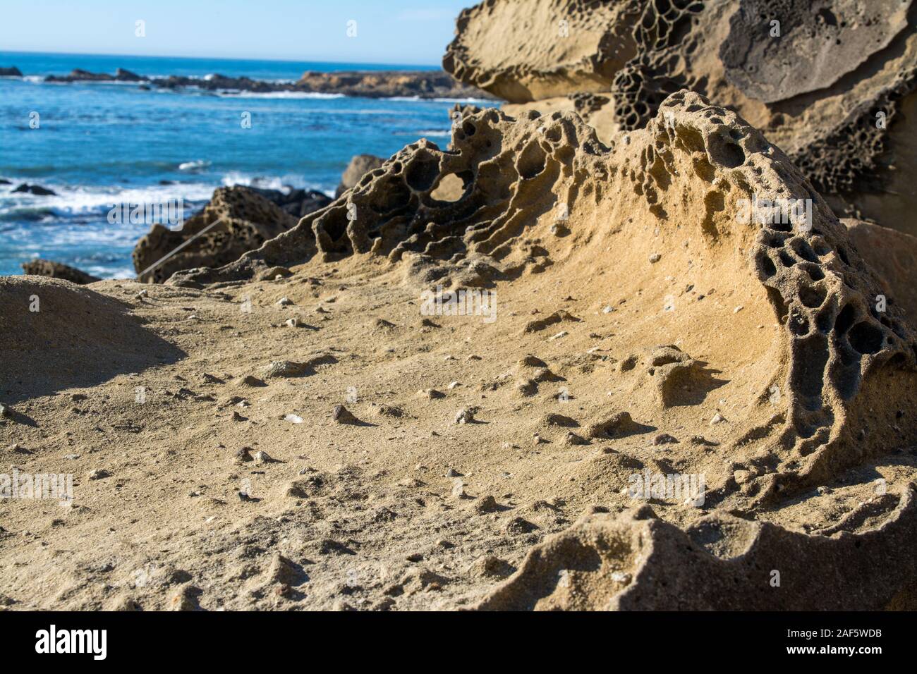 Sandstone cut in odd unique shapes from erosion Stock Photo - Alamy