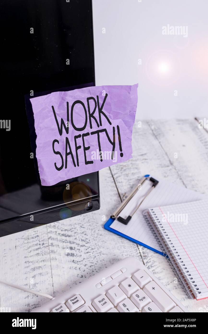 Writing note showing Work Safety. Business concept for policies and ...