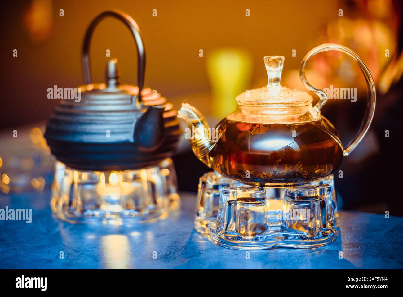 two teapots with brewed tea are on the table Stock Photo - Alamy