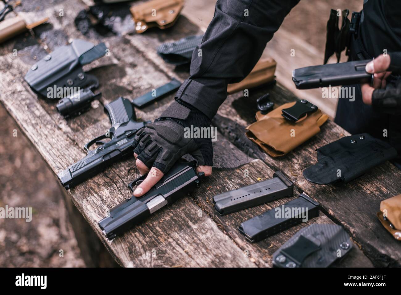 instructor in sport shooting to test your weapons in nature Stock Photo ...