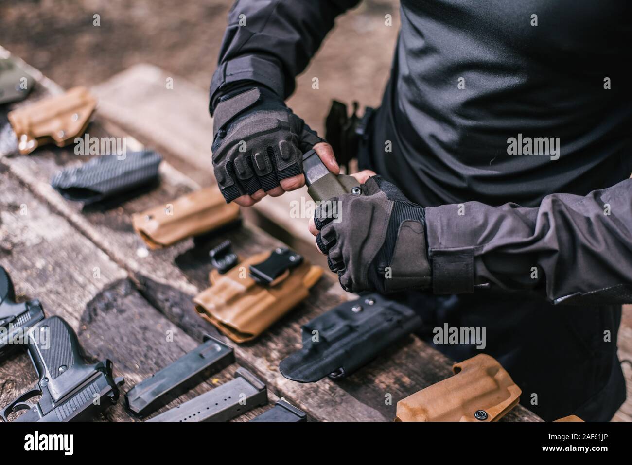 instructor in sport shooting to test your weapons in nature Stock Photo ...