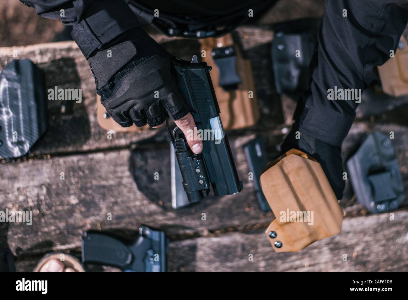 instructor in sport shooting to test your weapons in nature Stock Photo ...