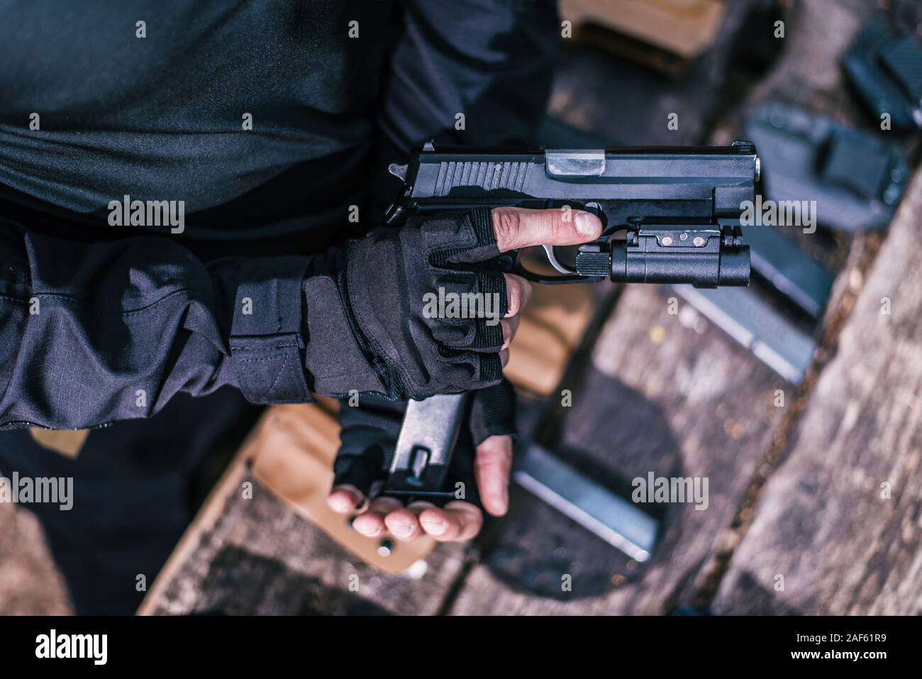 instructor in sport shooting to test your weapons in nature Stock Photo ...