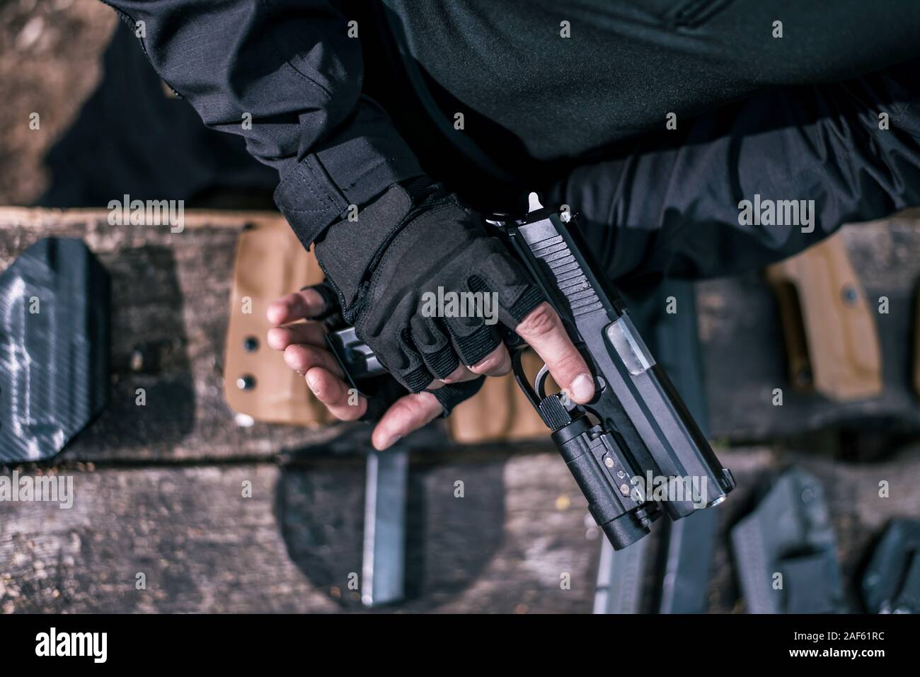 instructor in sport shooting to test your weapons in nature Stock Photo ...