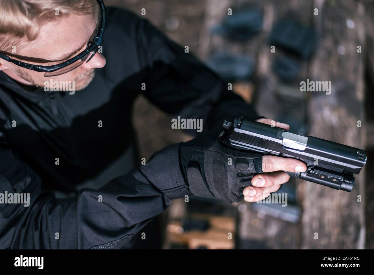 instructor in sport shooting to test your weapons in nature Stock Photo ...