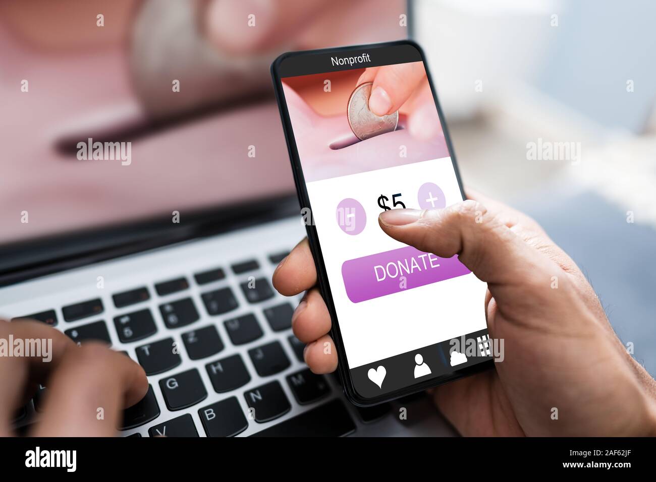 Young man giving mobile phone hi-res stock photography and images - Alamy