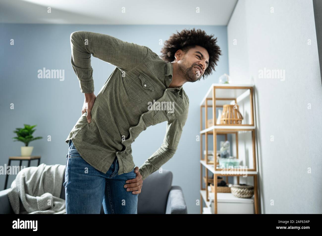 Backache back couch hi-res stock photography and images - Alamy