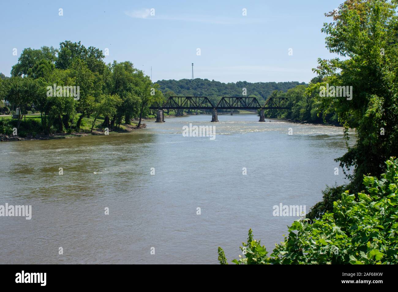 A railroad bridge over a large river Stock Photo - Alamy