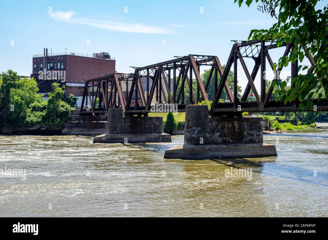 A railroad bridge over a large river Stock Photo - Alamy