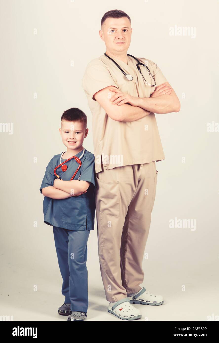 little boy with dad in hospital. happy child with father with ...